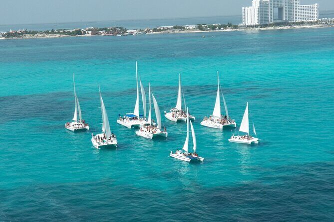 Catamaran to Isla Mujeres Snorkeling, Beach Club and Lunch Tour - Relaxing at the Beach Club