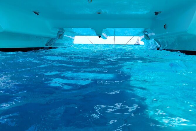 Catamaran Tour from La Caletta near Olbia  Experience Sardinias Coast - Overview of the Catamaran Tour from La Caletta