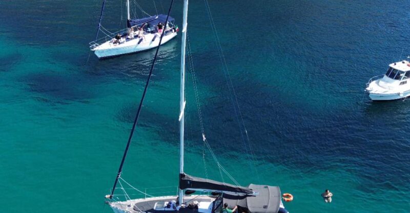 Catamaran tour, swimming, snorkeling, and a Prosecco toast - Convenient Departure from Central Cagliari