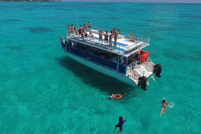 Catamaran Tour to Isla Mujeres all Included - The Boat and Crew