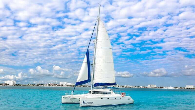 Catamaran Tour to Isla Mujeres from Cancun All Inclusive - Key Points