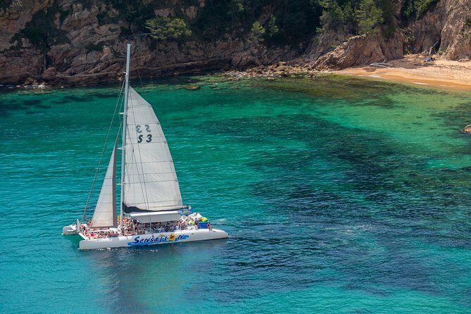 Catamaran trip with other groups along the Costa Brava. Saturday. - The Sum Up