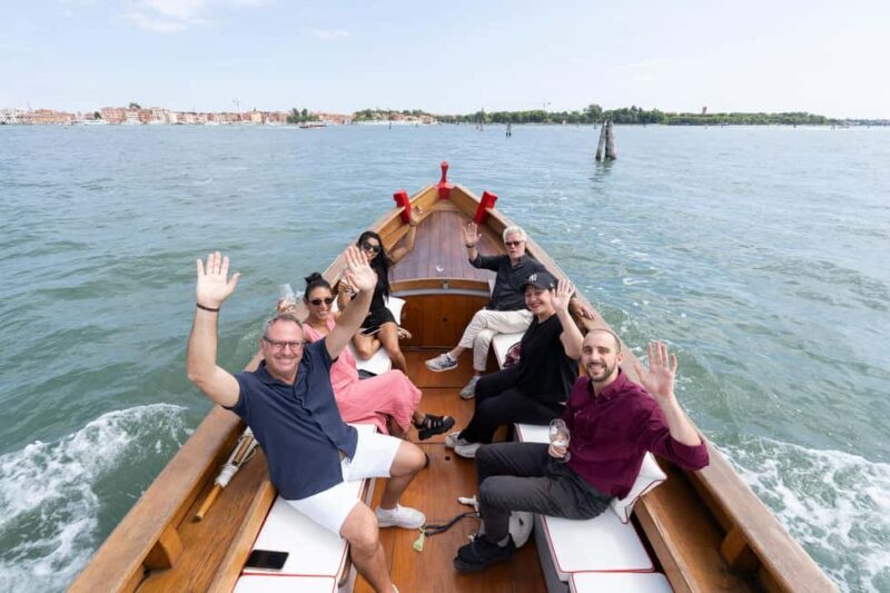 Check out Venice from a different angle: a scenic tour on a traditional boat. - Key Points