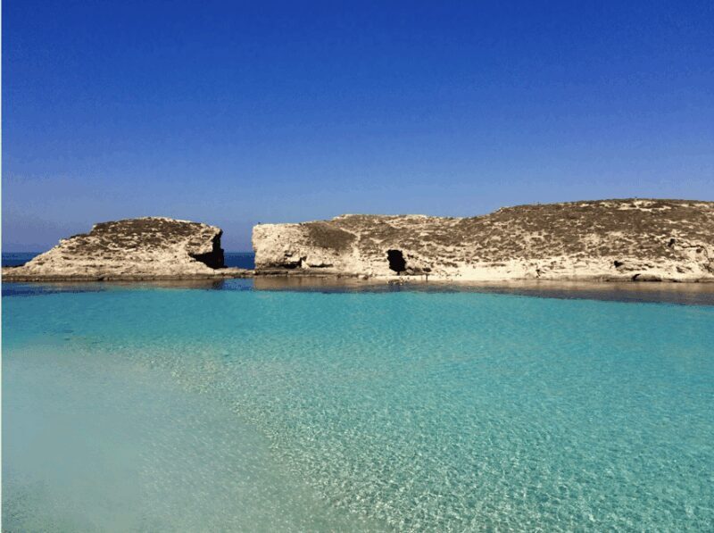 Comino's Best in a Flash: Caves, Coves & Beaches Boat Tour - The Guide & Experience