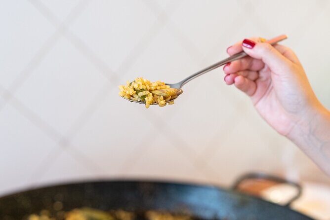 Cook your Paella with Purchase to Russafa Market in Valencia - The Sum Up