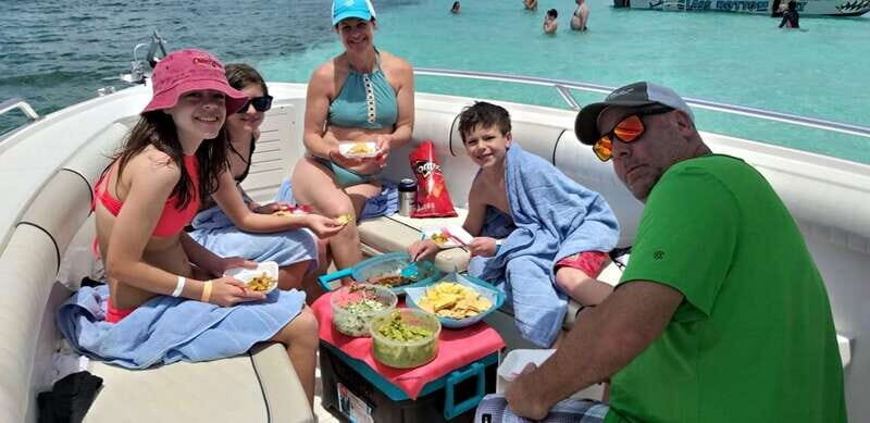 Cozumel: Private Charter Boat and Snorkel Day Trip - Snorkeling at a Secluded Reef