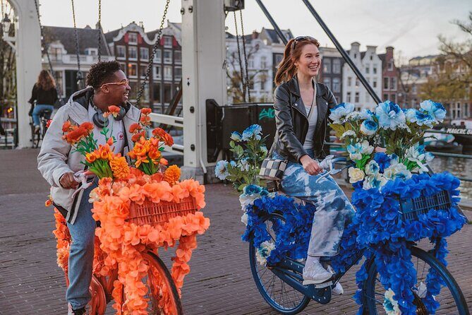 Explore Amsterdam canals on iconic Flower Bikes - Key Points