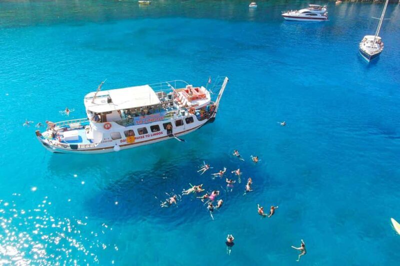Faliraki: Lindos Boat Cruise with Swim stops & Free Time - Key Points