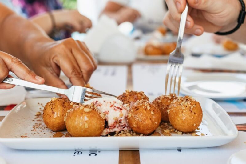 Fira: Guided Foodie Walking Tour with Tastings - Guides: Knowledge, Charisma, and Local Insight