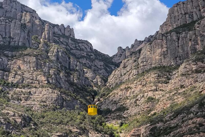 From Barcelona: Montserrat by Train, Cable Car and Cogwheel - Scenic Train Ride Through Catalonia