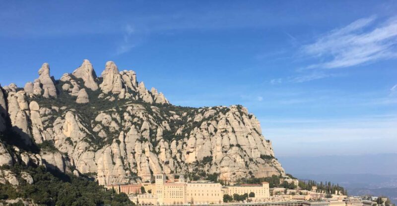 From Barcelona: Montserrat Mountain Hike and Abbey Tour - Key Points