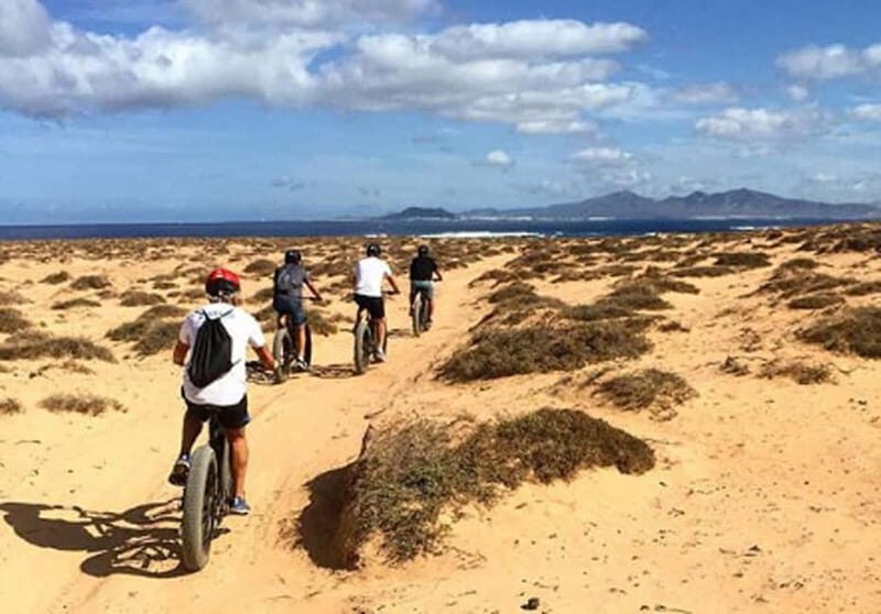 From Corralejo: Fuerteventura Guided E-Bike/E-scooter Tour - Key Points