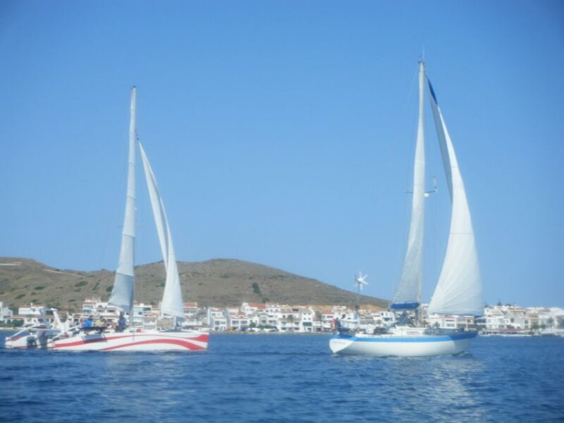 From Fornells: Half-Day Menorca Catamaran Trip w/ Snorkeling - The Sum Up