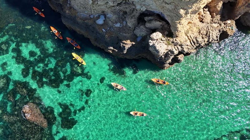 From Lagos: Ponta da Piedade Caves Kayak Tour from Catamaran - Post-Kayak Activities: Swim, Sunbathe, and Slide