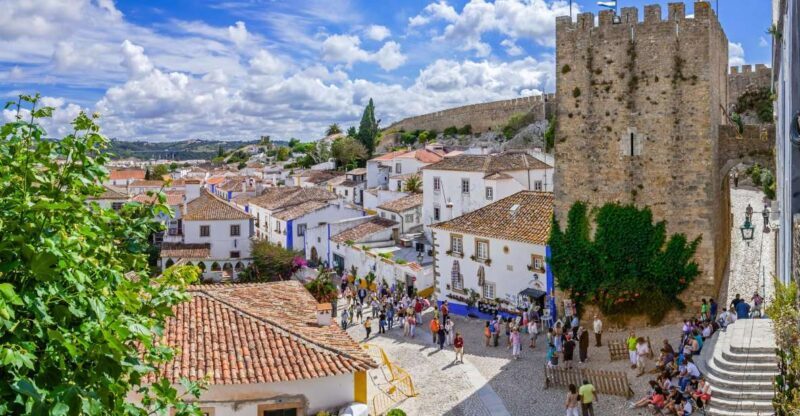 From Lisbon: Fatima, Nazare, and Obidos 8-People Group Tour - Exploring Portugal’s Sacred and Scenic