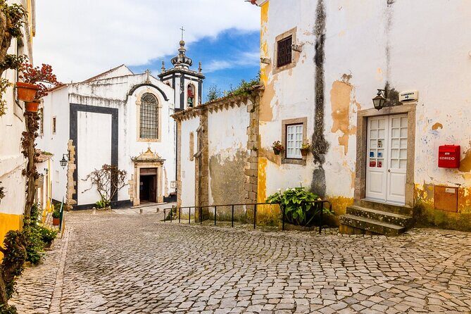 From Lisbon : Óbidos & Nazaré Giant Waves, Ginja & Small Group - FAQs