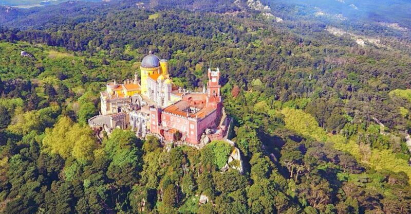 From Lisbon: Sintra Pena Palace Cascais 8-People Group Tour - Pena Palace: A Colorful Masterpiece