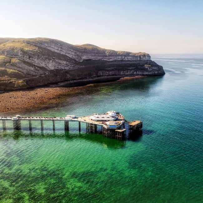 From Llandudno: Portmeirion, Snowdonia and Castles Tour - Key Points