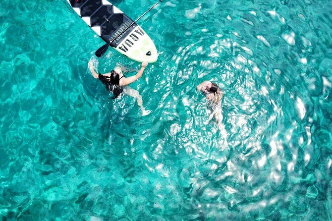 From Mykonos: Small Group Delos and Rhenia Catamaran Tour - Exploring the Small-Group Delos and Rhenia Catamaran Tour from Mykonos