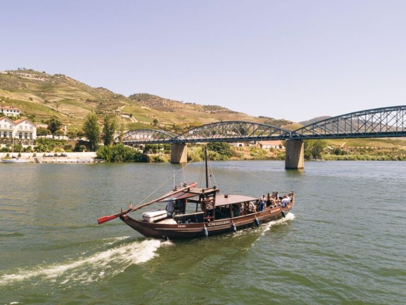 From Pinhão: Douro Valley Rabelo Boat Tour with Port Wine - The Experience and Atmosphere Onboard
