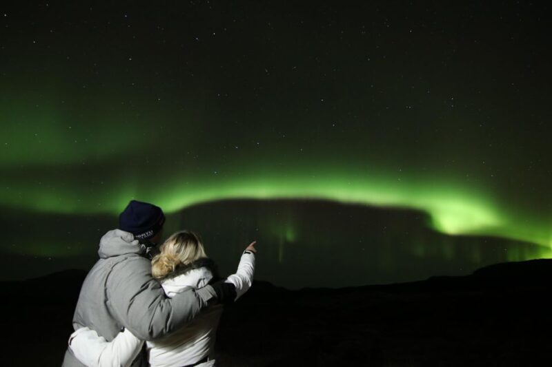 From Reykjavik: Northern Lights Tour with Hot Cocoa & Photos - Key Points