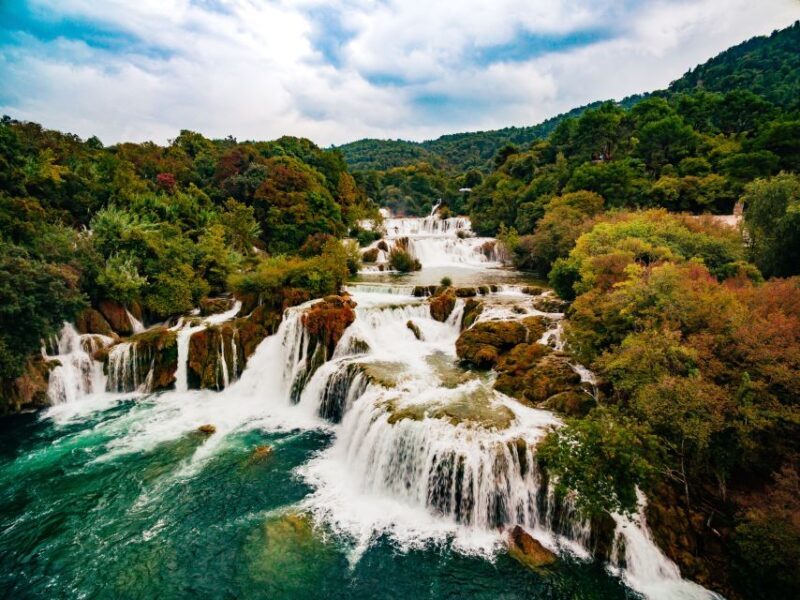 From Split & Trogir: Krka Waterfalls Day Tour with Boat Ride - Authentic Village and Historical Features