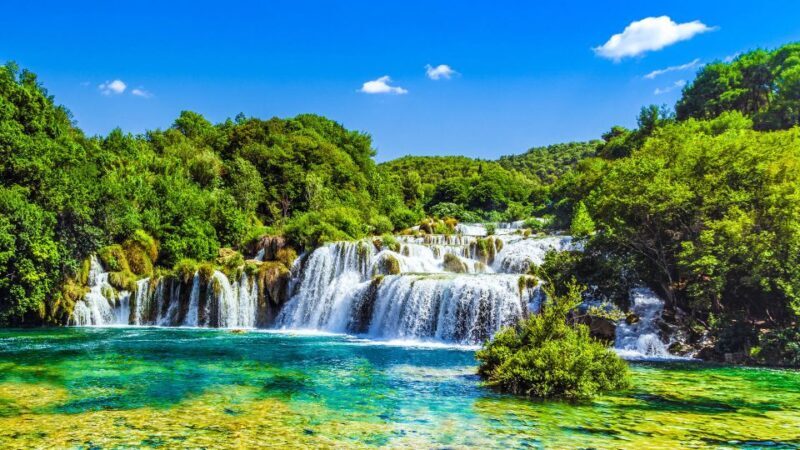From Split & Trogir: Krka Waterfalls Day Tour with Boat Ride - Educational and Scenic Stops