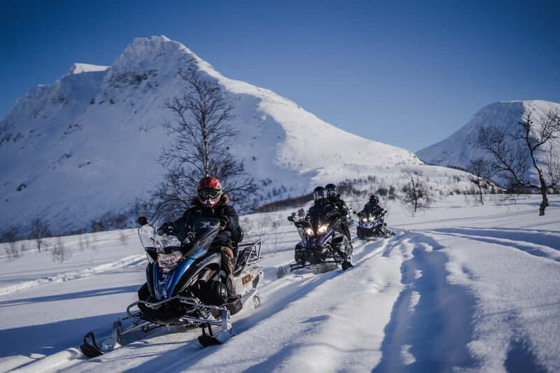From Tromsø: Snowmobiling at Camp Tamok & Snow Park Visit - Midway Break and Traditional Meals