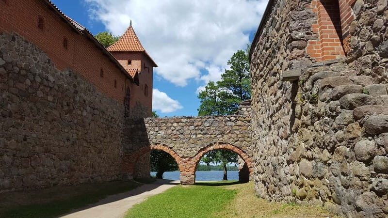From Vilnius: Trakai Castle and Paneriai Memorial Tour - Key Points  