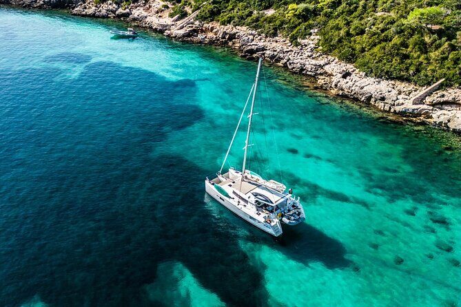 Full day catamaran tour in Alghero - Key Points