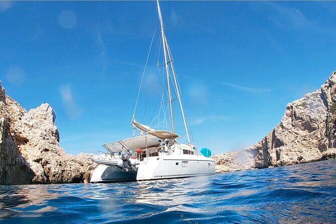 Full day catamaran tour in Alghero - The Sum Up