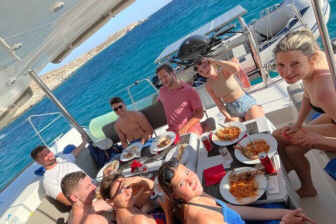 Full Day Discovering Mykonos Delos Renia Tour by Boat - The Guides and Crew