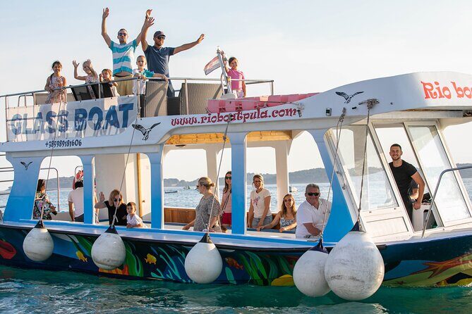 Glass boat tour Faana with swimming stop - The Sum Up