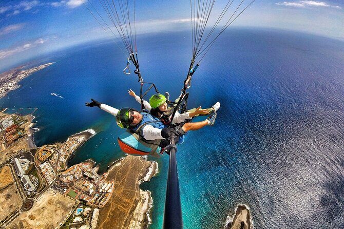 GOLD paragliding flight including videos/photos, t-shirt and a bottle of Cava - The Sum Up