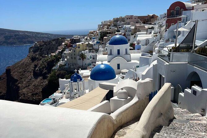GreekAmerican guide Themistoklis to tour beautiful Santorini. - Key Points