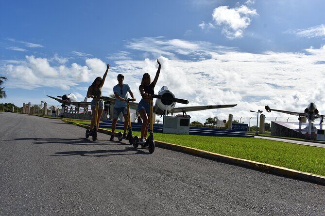 Guided Day Tour in Cozumel on a Clear Boat and Electric Scooter - Key Points