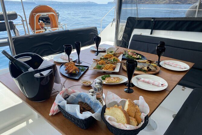 Half Day Premium Catamaran Cruise in Santorini including Oia - Frequently Asked Questions