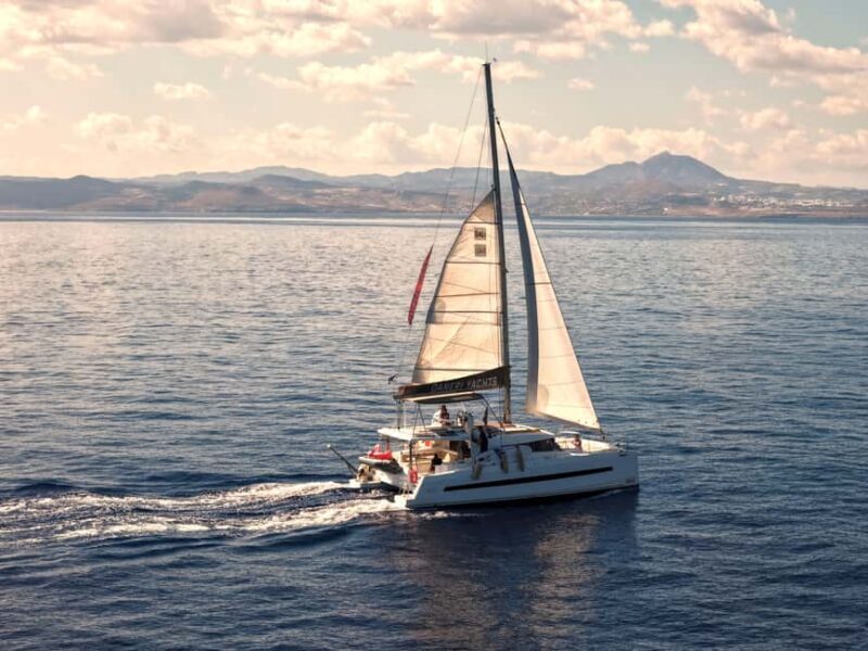 Hersonissos: Luxury Sunset Catamaran Cruise Sushi & Open Bar - Key Points