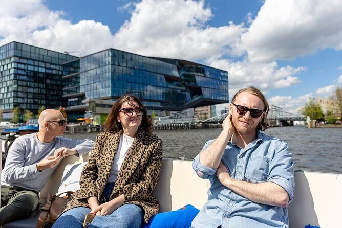Highlights and Local Insights Canal Cruise Tour in Amsterdam - Practical Details and Tips