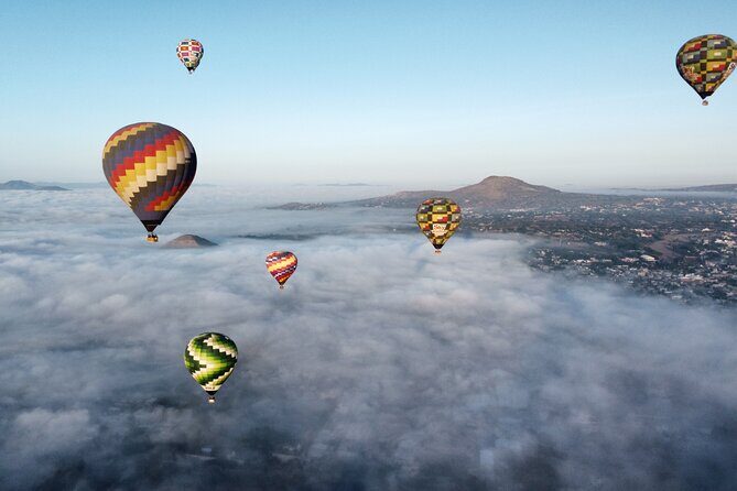 Hot Air Balloon Flight with Breakfast in Cave and Transportation - Key Points