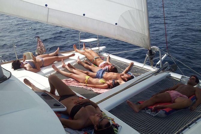 Ibiza Beach Hopping by Catamaran - Authentic Guest Experiences