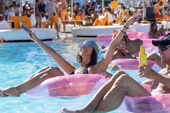 Ibiza Pool Crawl With O beach and Open bar - Beach Bar Stop: Basking in the Sun and Sipping Drinks