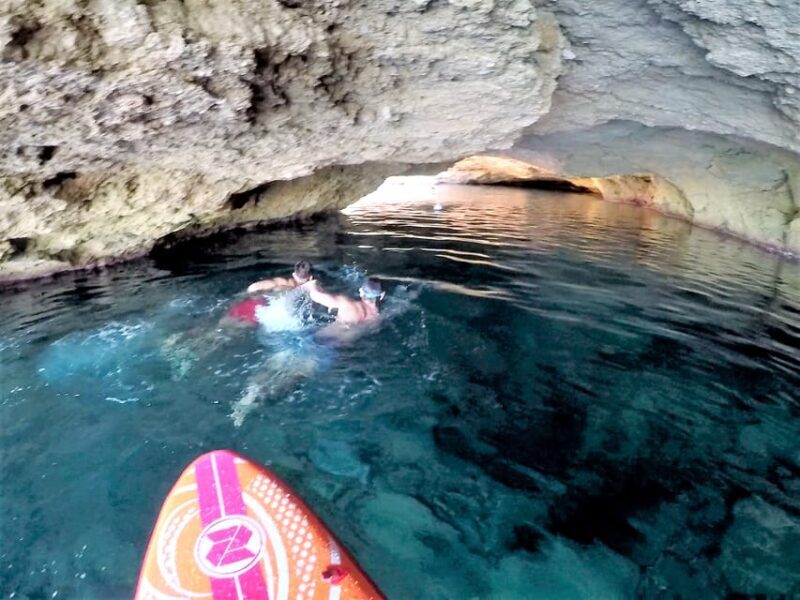 Ibiza: Sea Caves & Coves Snorkeling Paddle Boarding Tour - The Boat and Atmosphere