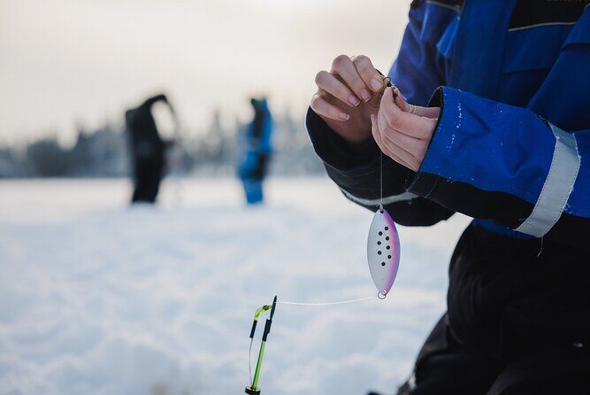 Ice Fishing and Snowmobile Safari Combo in Lapland - A Deep Dive into the Arctic Adventure