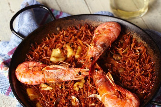 Interactive Paella & Market: Bottomless Wine & Rambla Views - FAQs