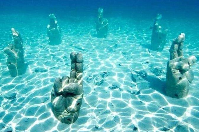 Isla Mujeres on luxury catamaran with snorkel, open bar and lunch - FAQs