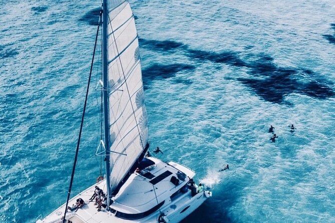 Isla Mujeres sailing tour in catamaran Open Bar& Lunch Included - Starting Point and Departure