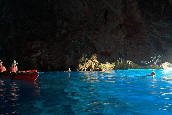 Kayak Trip to Hidden blue Cave, with lunch & fruits. - Sheltering in a Secluded Cave and Spotting Wildlife