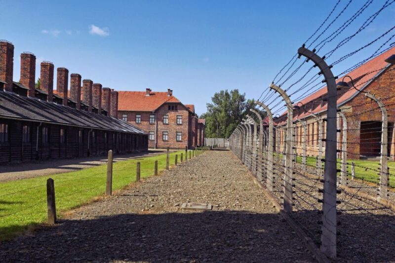 Krakow: Auschwitz Guided Tour with Optional Hotel Pickup - Return Journey and Reflection