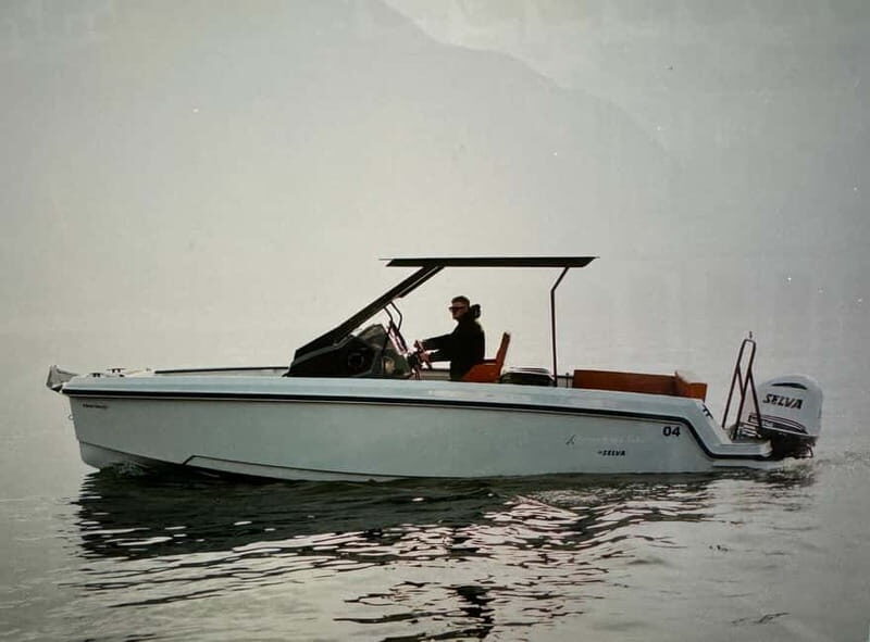 Lake Como Boat tour share- prosecco and winter cover - A Closer Look at the Lake Como Boat Tour Experience